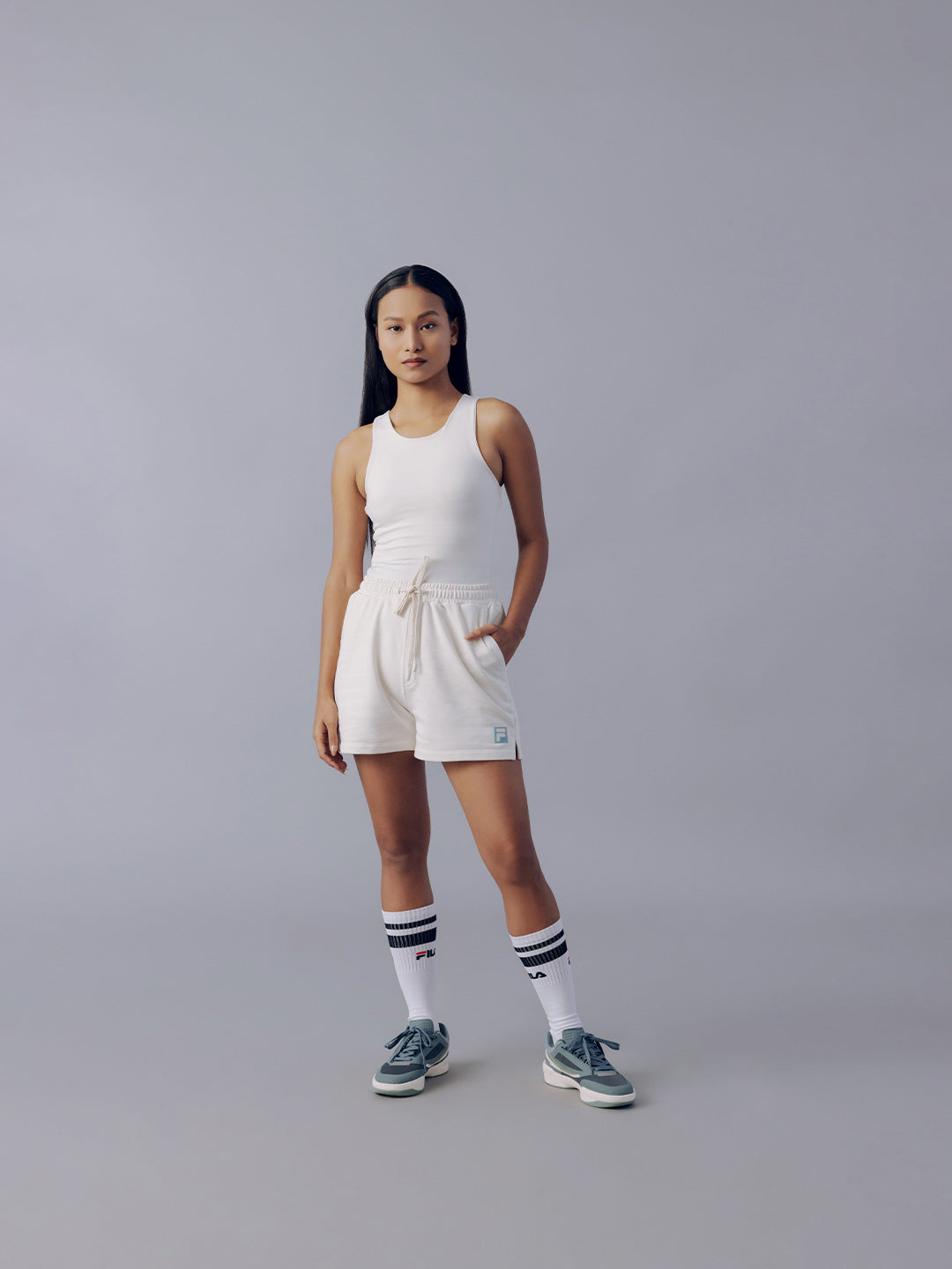 Buy Fila Off White Women Off White Eva Body Suit @ Rs 1873.06 | Fila India